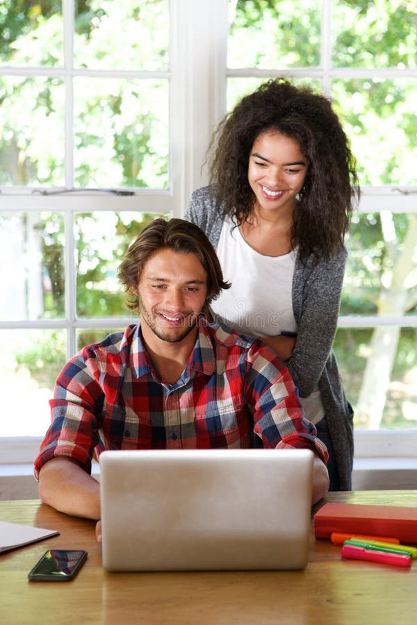 Two People Working from Home on Laptop Stock Image - Image of beautiful ...