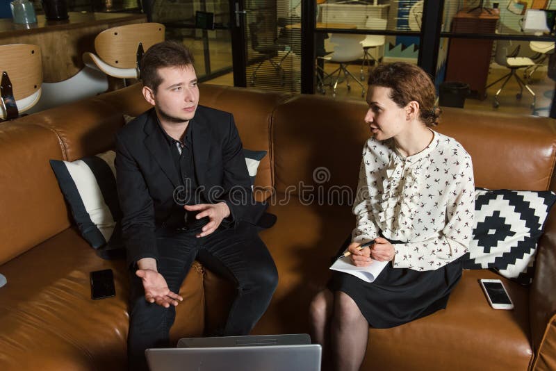 Two People Working at the Office. Client and Manager Conversation Stock ...