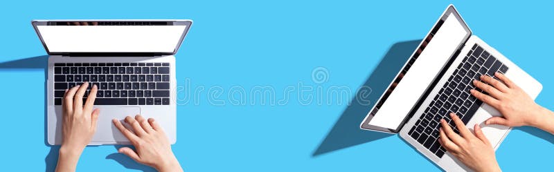 Two People Working Together with Laptop Computers Stock Photo - Image ...