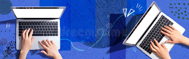 Two People Working Together with Laptop Computers Stock Photo - Image ...