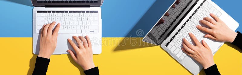 Two People Working Together with Laptop Stock Photo - Image of finance ...