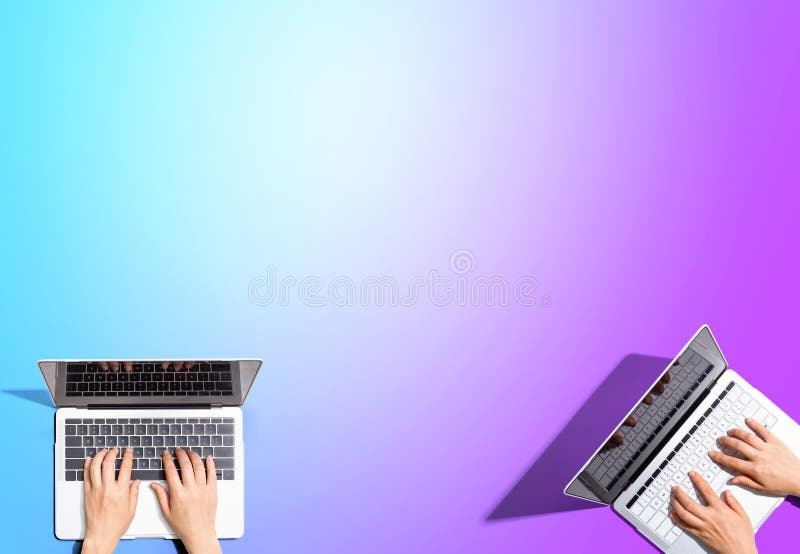 Two People Working Together with Laptops Stock Image - Image of desk ...
