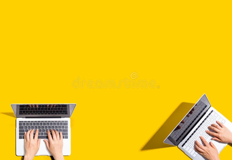 Two People Working Together with Laptops Stock Image - Image of ...