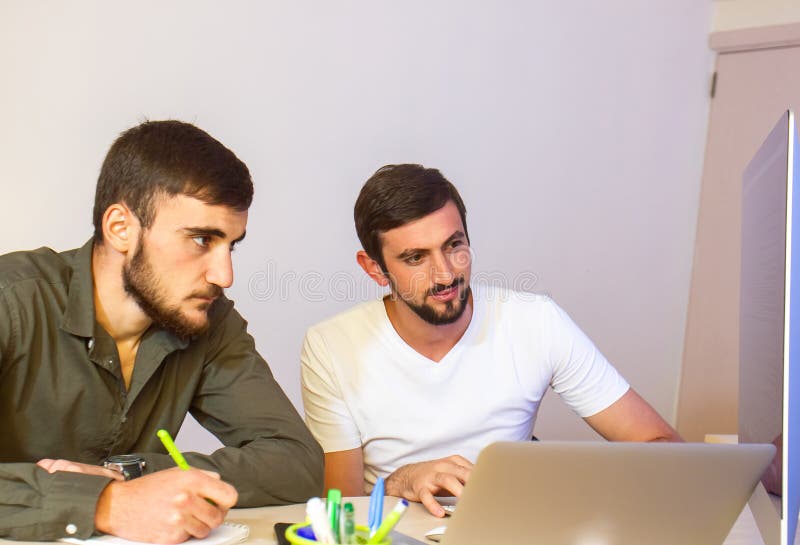 Two People Working Together in Office Stock Photo - Image of chart ...