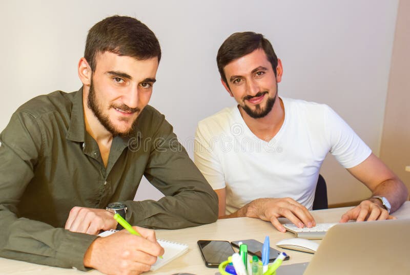 Two People Working Together in Office Stock Photo - Image of caucasian ...
