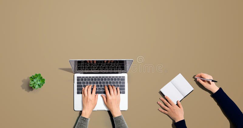 Two People Working Together Stock Image - Image of note, laptop: 158665207