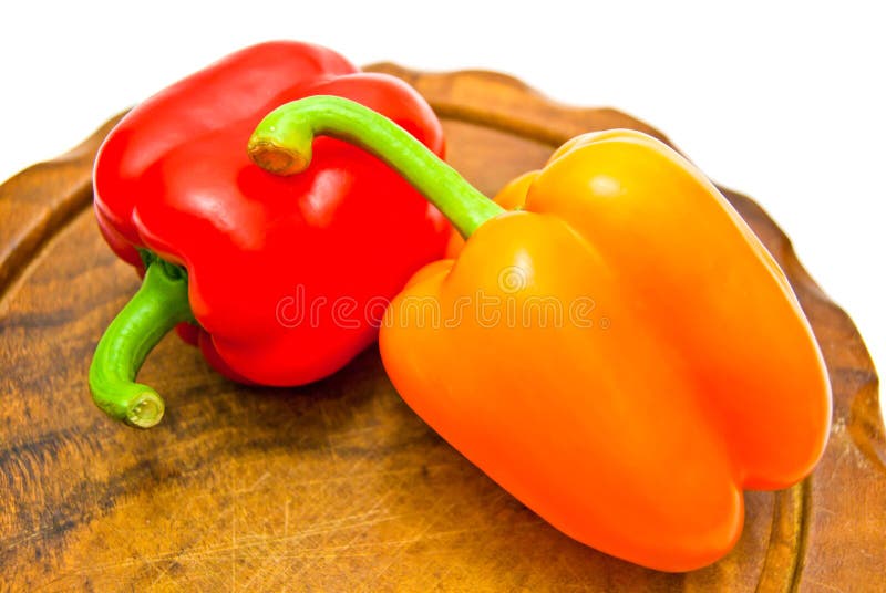 Two Peppers on Cutting Board Stock Photo - Image of vegetable, paprika ...