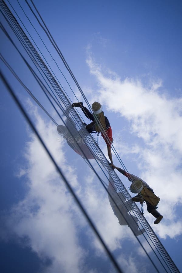 Business People Climbing A Building Stock Photo - Image of scale ...