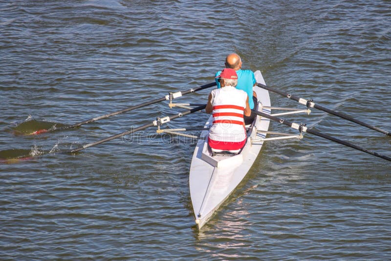 Two Persons Rowing Boat on Arno River, Florence, Italy Editorial Photo ...