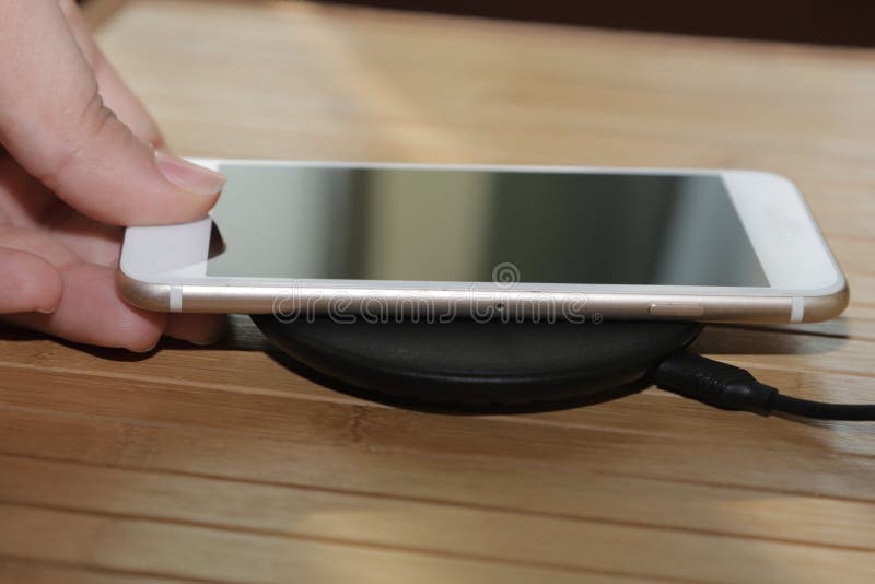 Two Phones on Charging One Wired Another Wireles Stock Image - Image of ...