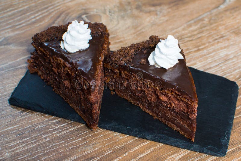 Two Pieces of Cake on a Stone Plate Stock Image - Image of plate, meal ...