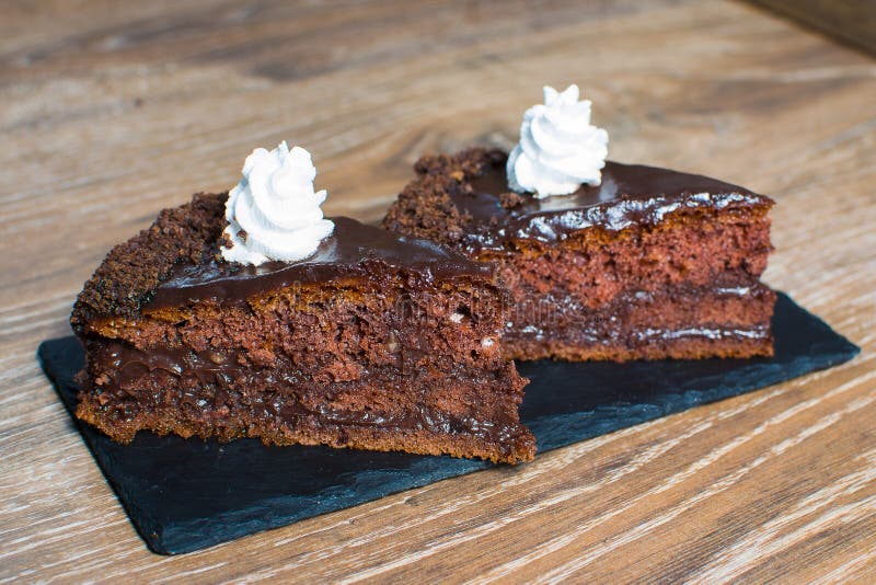 Two Pieces of Cake on a Stone Plate Stock Image - Image of homemade ...