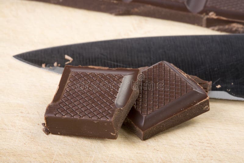 Two pieces of chocolate stock image. Image of calorific - 18140973