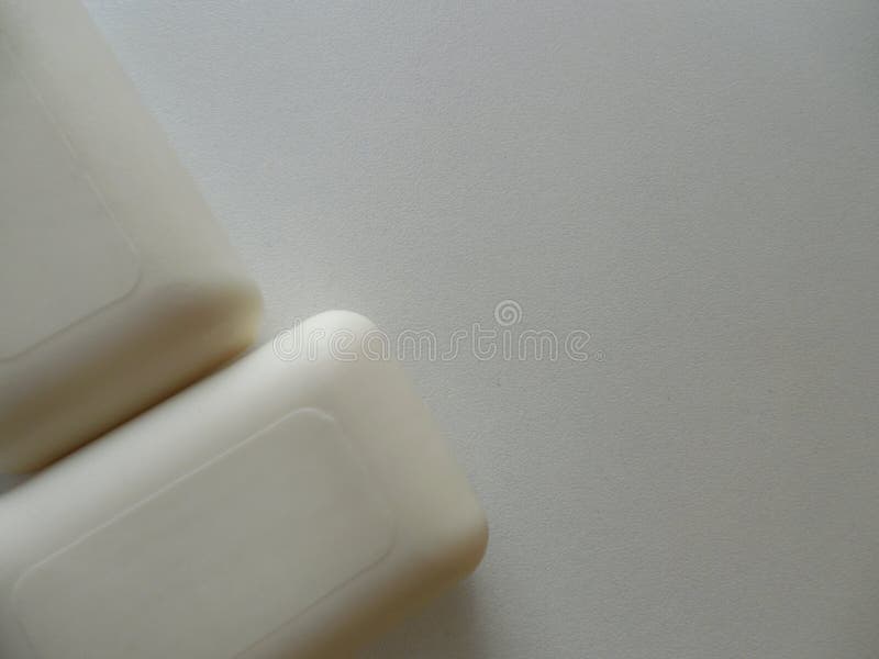 Two Pieces of Half White Soap Stock Image - Image of soap, shape: 152399233