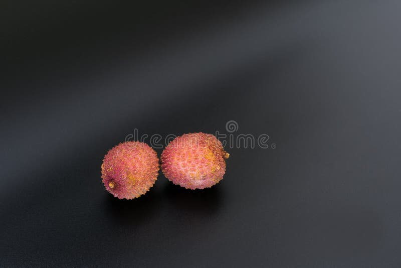 Two Pieces of Lychee on Black Background Stock Image - Image of still ...