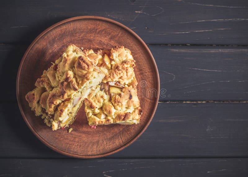 Two Pieces of Pie on Brown Clay Plate Stock Image - Image of making ...