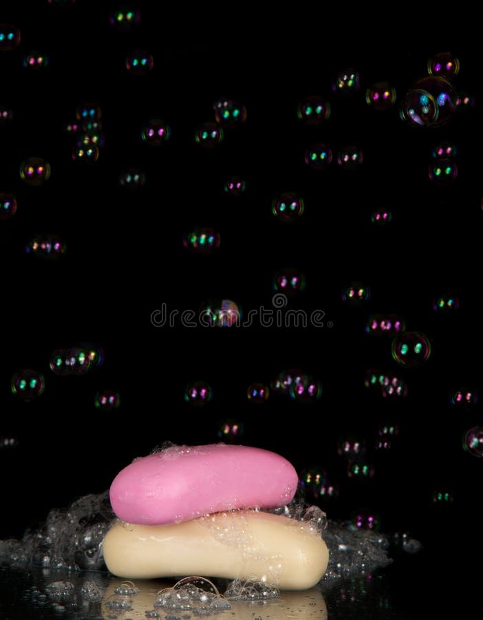 Two Pieces of Soap and Soapsuds with Air Bubbles Stock Photo - Image of ...