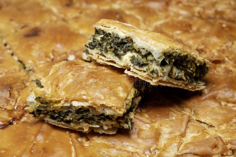 Two pieces of spinach pie stock photo. Image of greece - 303730172