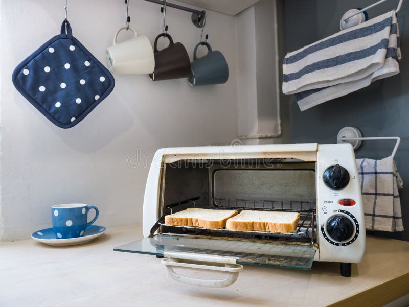 Two Pieces of Toasts in the Oven. Stock Image - Image of burning, heat ...