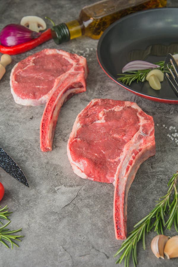 Two Pieces of Tomahawk Steak, Side View Stock Image - Image of protein ...