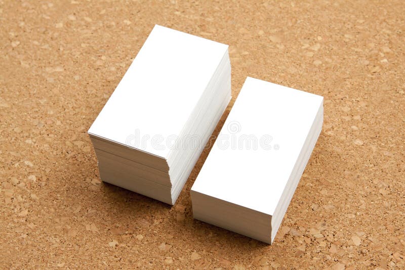 Two Piles of Business Cards on Corkboard Backgroun. Stock Image - Image ...