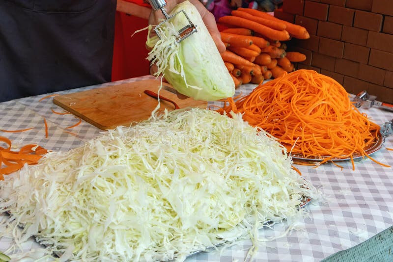 Two Piles of Cabbage and Carrot Strips Stock Photo - Image of shredded ...