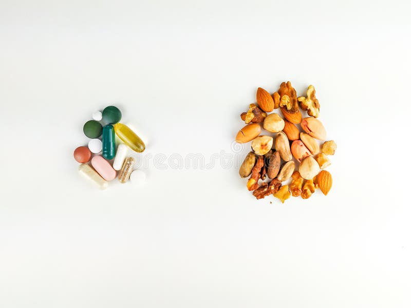Two Piles of Different Types of Vitamins and Supplements, with Natural ...