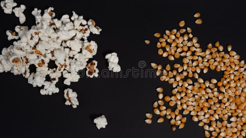 Two Piles of Popcorn, One Pile of Ready Popcorn, Another with Corn ...