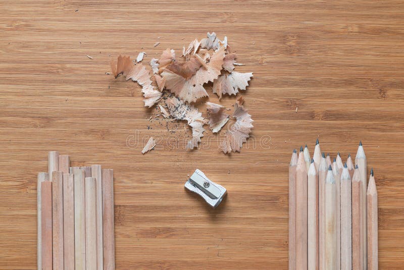 Two Piles of Wooden Pencils. the Pencil Sharpening Process Stock Photo ...