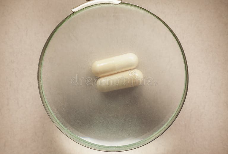 Two Pills stock image. Image of conceptual, circle, magnify - 55376981