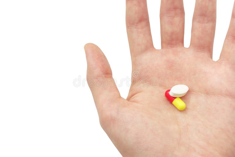 Two pills on the palm stock photo. Image of close, finger - 12583044