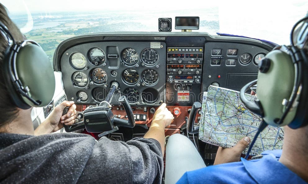Two pilots flying stock photo. Image of c172, controls - 57328396