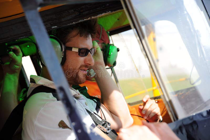 Two Pilots Testing the Radio Stock Photo - Image of cockpit, fashioned ...