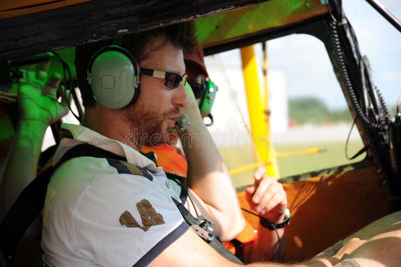 Two Pilots Testing the Radio Stock Photo - Image of flight, microphone ...