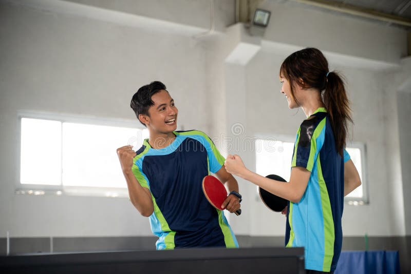 Two Ping Pong Players Compete Excitedly when they Score Points Stock ...
