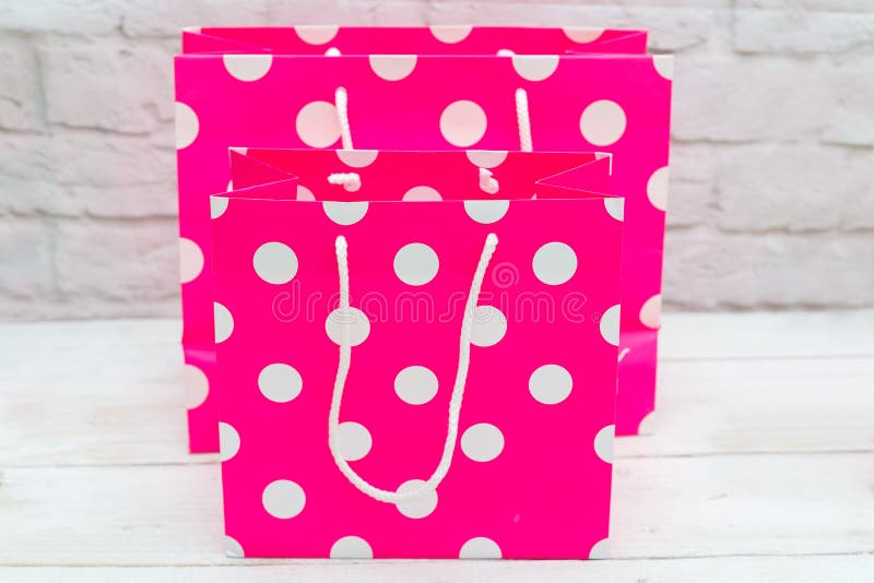 Two Pink Paper Shopping Bags Stand on the Table Stock Image - Image of ...