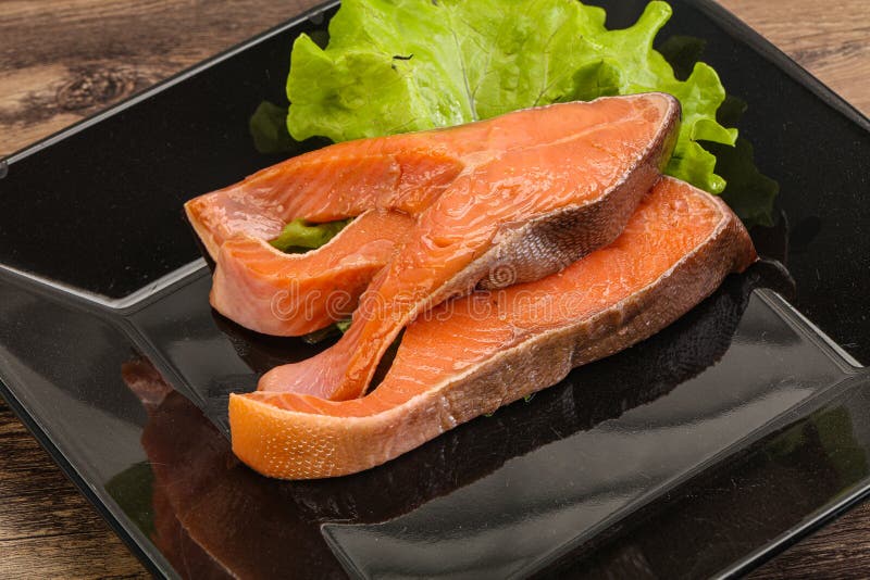 Two pink salmon fish steak stock photo. Image of cuisine - 201100300