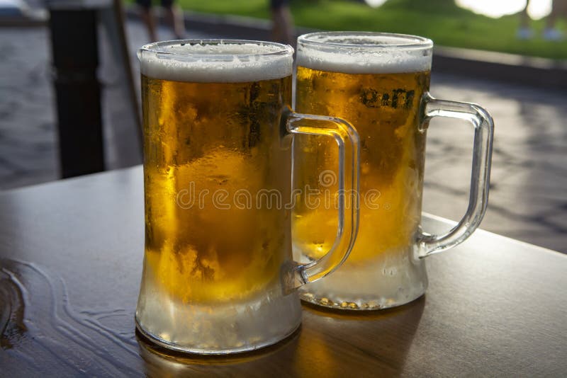 Two Pint Glasses with Cold Beer Served Outdoor Stock Photo - Image of ...