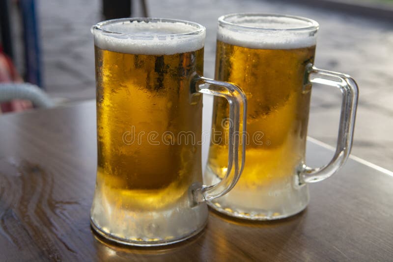 Two Pint Glasses with Cold Beer Served Outdoor Stock Photo - Image of ...