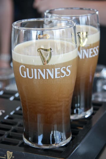 Two Pints of Beer Served at the Guinness Brewery Editorial Photo ...