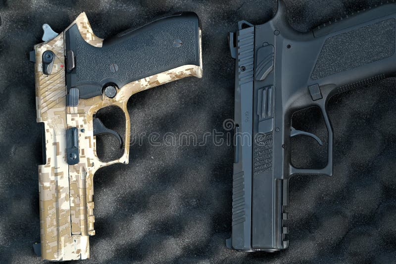 Two Pistols Close-up. 9 Millimeters. Military Weapon Stock Photo ...