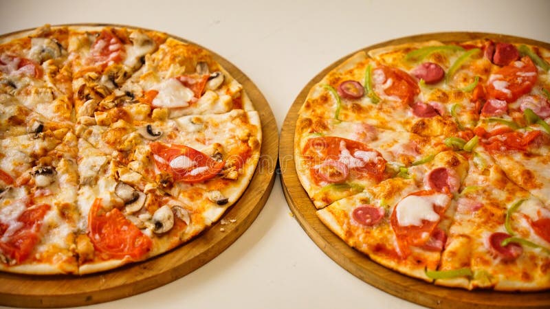 Two Slices of Pizza stock image. Image of italian, round - 327663681