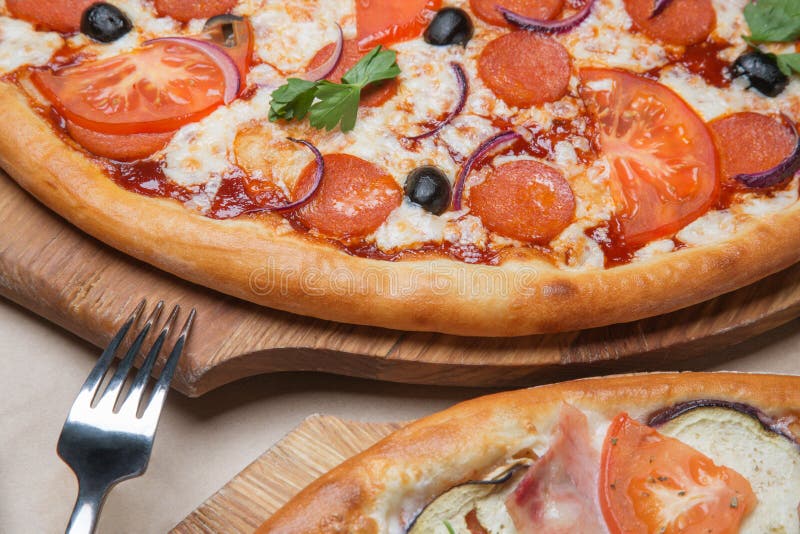 Two pizzas on the table stock image. Image of chopping - 91868225