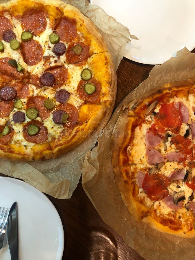 Two Pizzas are on the Table Vertical Photo. Selectiv Focus Stock Image ...