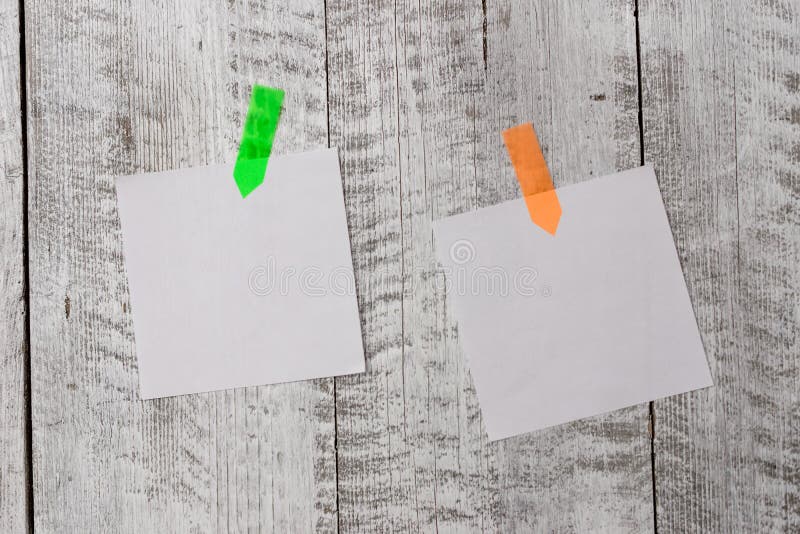 Two Plain Note Papers Stick To Wooden Table. Plentiful of Blank Sheets ...