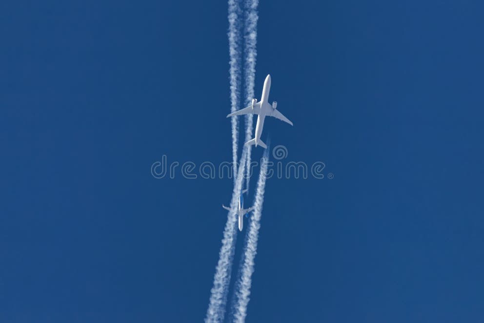 Two Planes Flying on Opposite Courses Meet in the Sky Stock Image ...