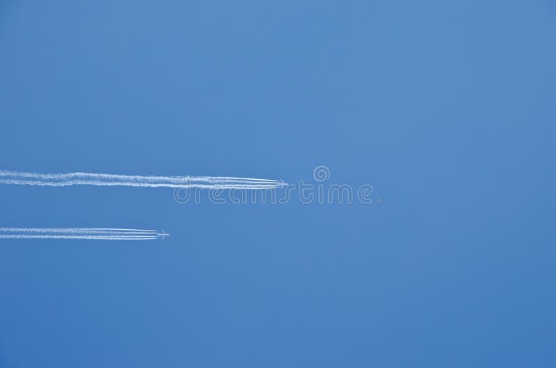 Two Planes Flying in Parallel Stock Image - Image of track, airplane ...