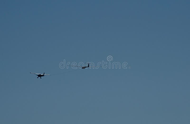 Two Planes that are Flying Side by Side in the Sky Stock Image - Image ...