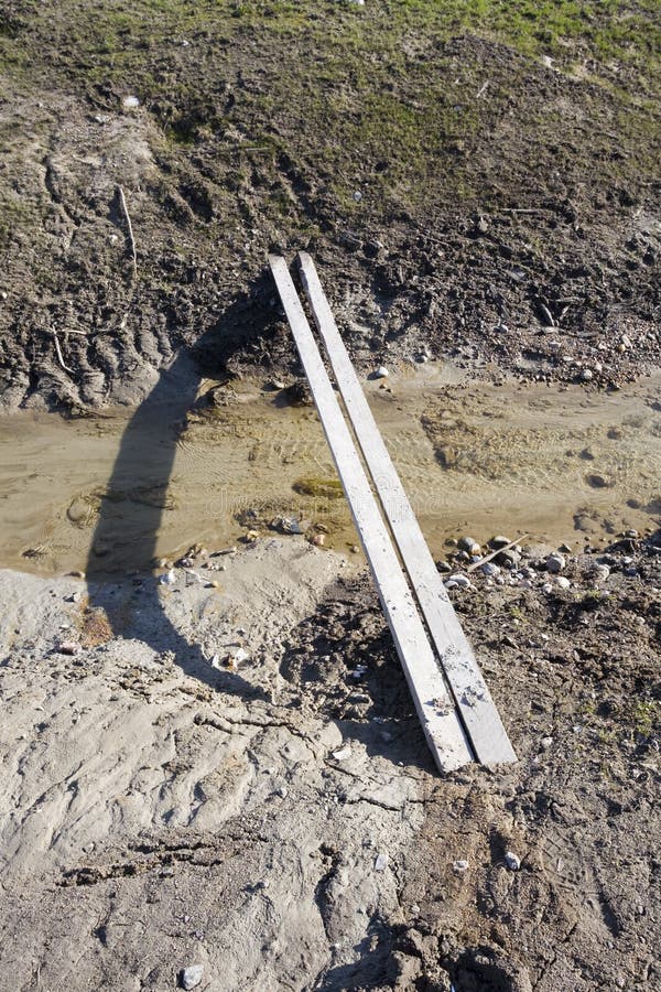 Two Planks Crossing Over a Ditch Stock Image - Image of wooden, boards ...