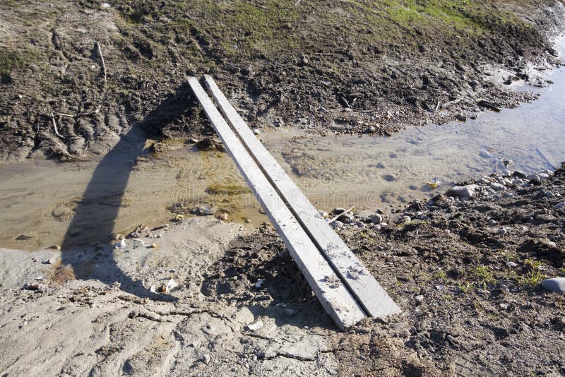 Two Planks Crossing Over a Ditch Stock Image - Image of wooden, boards ...
